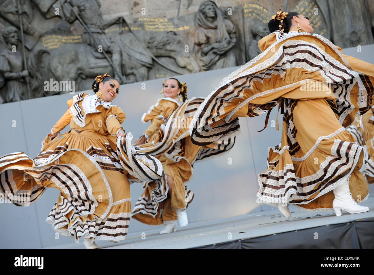 Ballet folklorico dancers perform onstage at Plaza Fundadores in ...