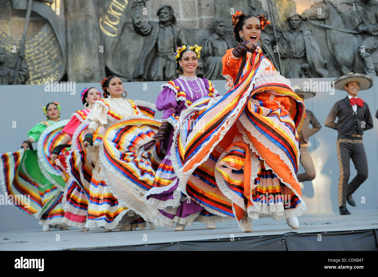 Ballet folklorico dancers perform onstage at Plaza Fundadores in ...