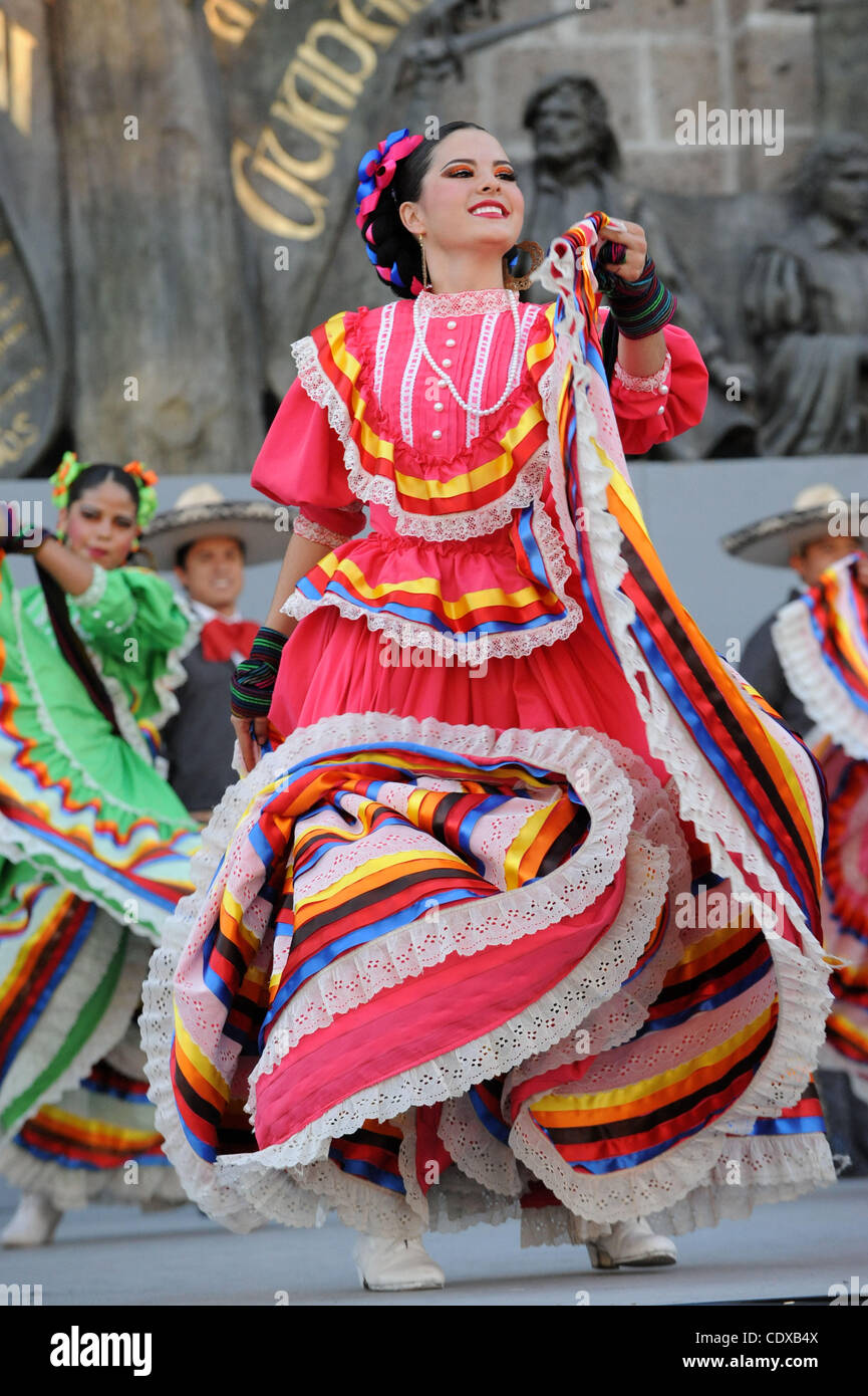 Ballet folklorico dancers perform onstage at Plaza Fundadores in ...