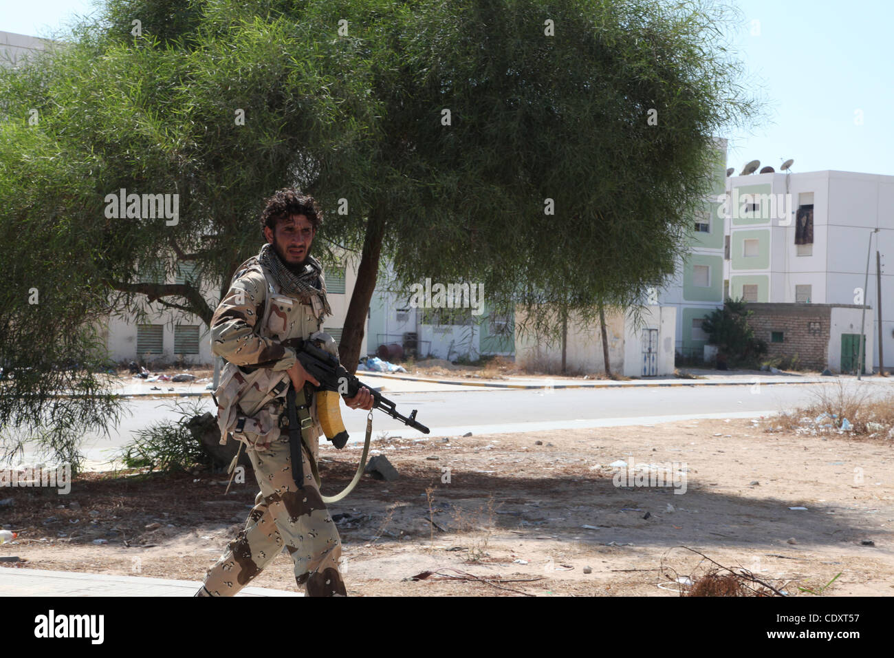 Heavy fighting in Gaddafi's last stronghold Stock Photo - Alamy