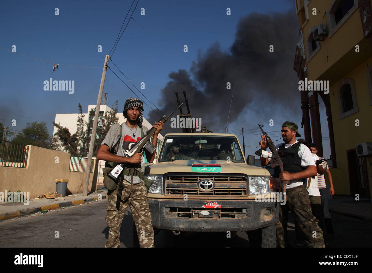 Heavy fighting in Gaddafi's last stronghold Stock Photo - Alamy