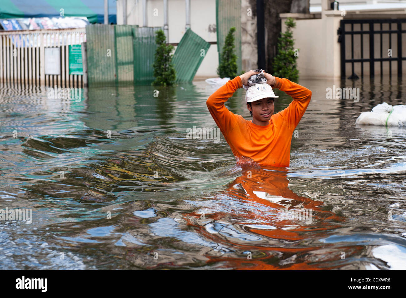 Oct. 29, 2011 - Bangkok, Bangkok, Thailand - A young boy wands through ...
