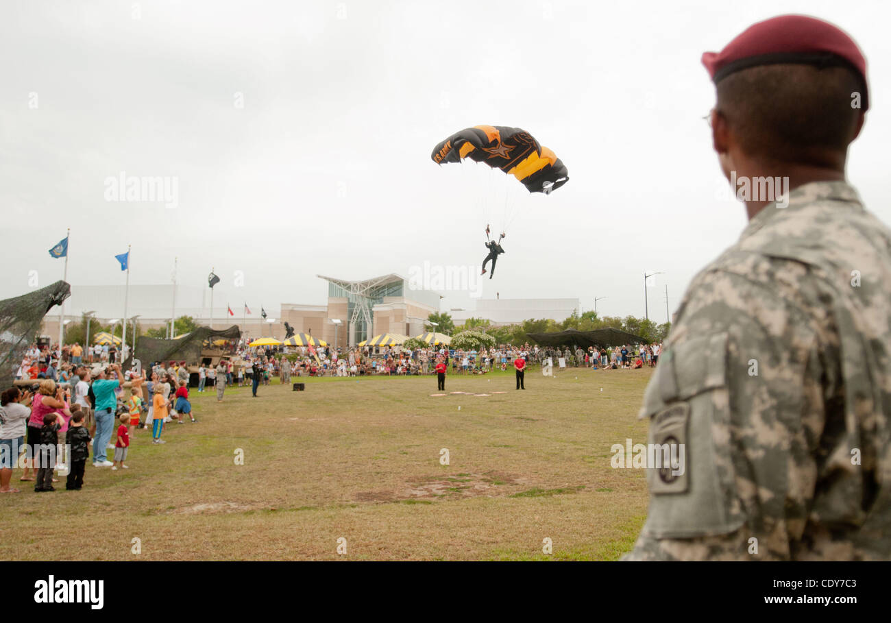 A paratrooper from the U.S. Army Golden Knights parachute demonstration ...