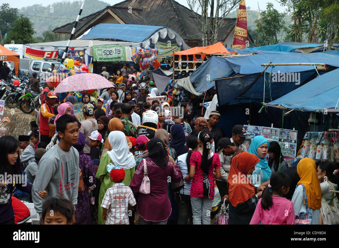 The indigenous Sundanese tribe parading with freshly harvested during ...
