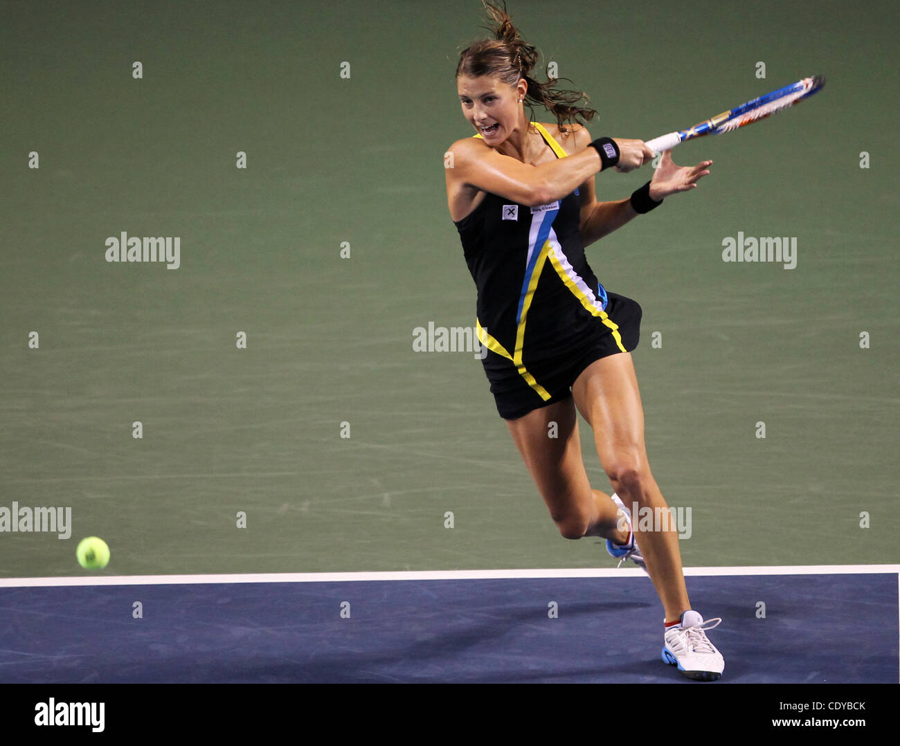 Sept. 26, 2011 - Tokyo, Japan - Mandy Minella of Luxembourg returns the ...