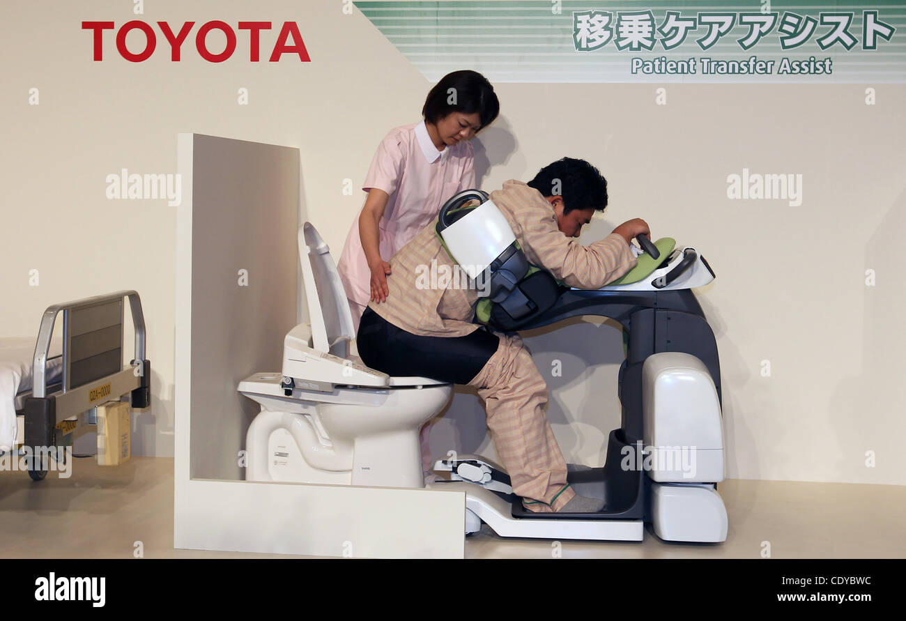 Nov. 1, 2011 - Tokyo, Japan - Man demonstrates to show Toyota Motors's ...