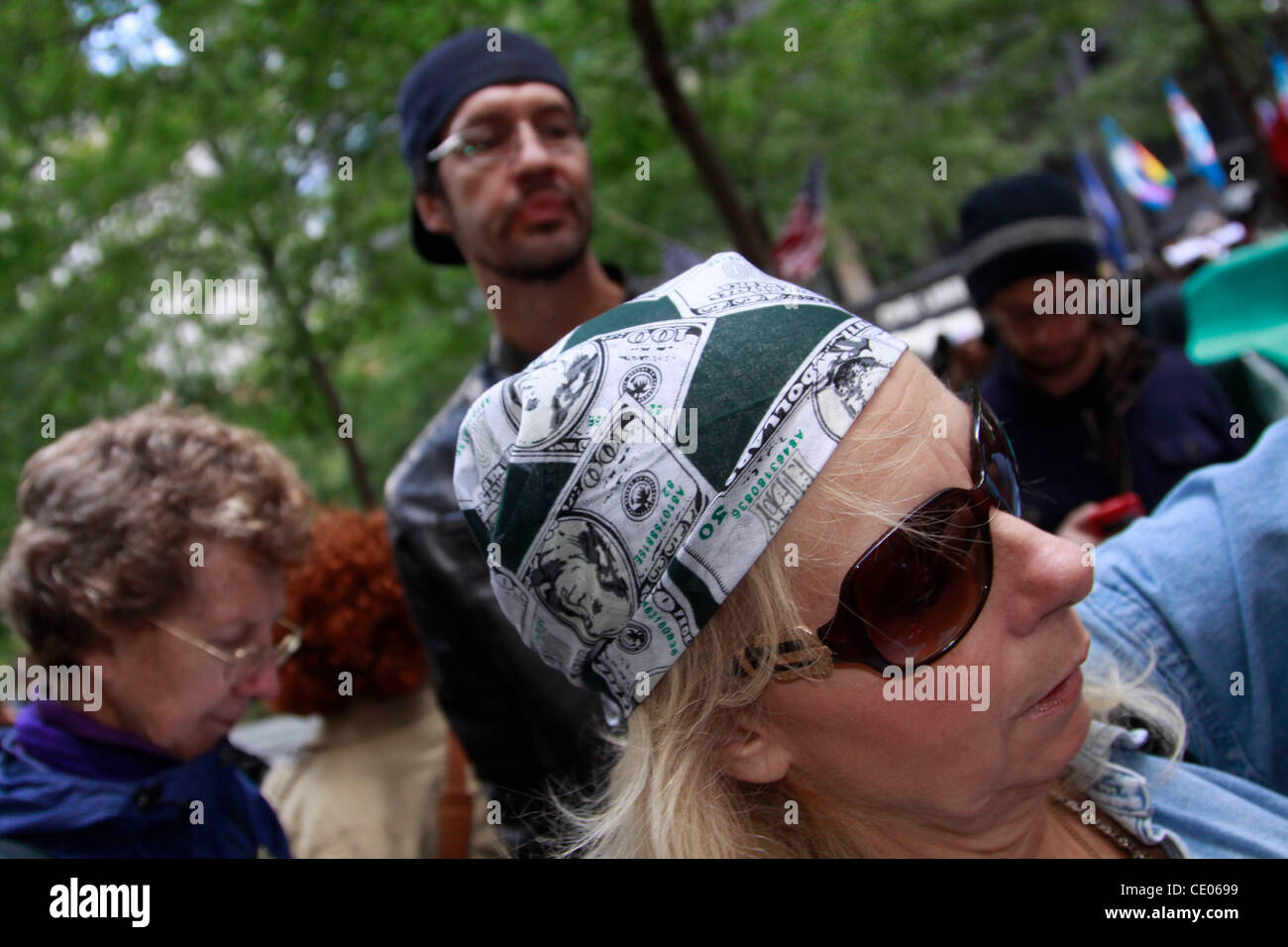 Oct. 22, 2011 - New York, New York, U.S. - A woman wears a money motif ...
