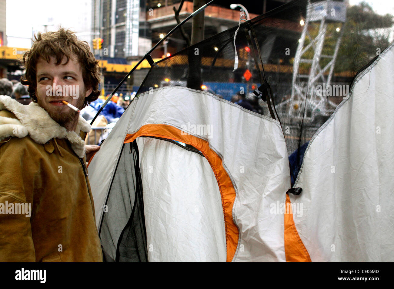 An Occupy Wall Street protester called Ellis smokes a cigarette as ...