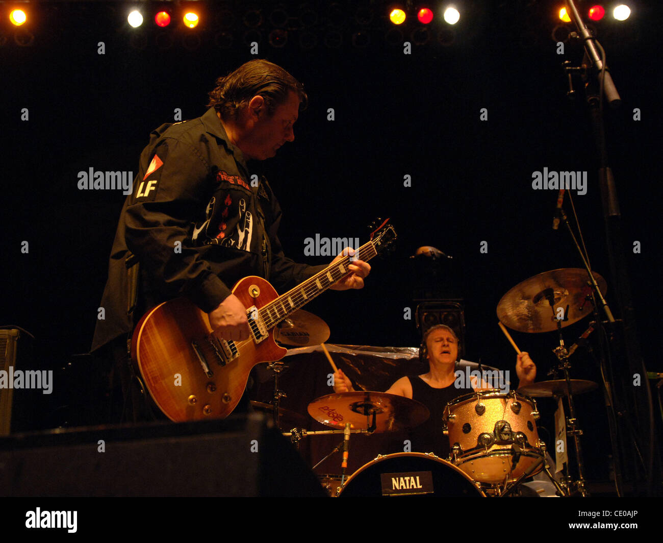 Punk rockers STIFF LITTLE FINGERS playing in the rain and getting the ...