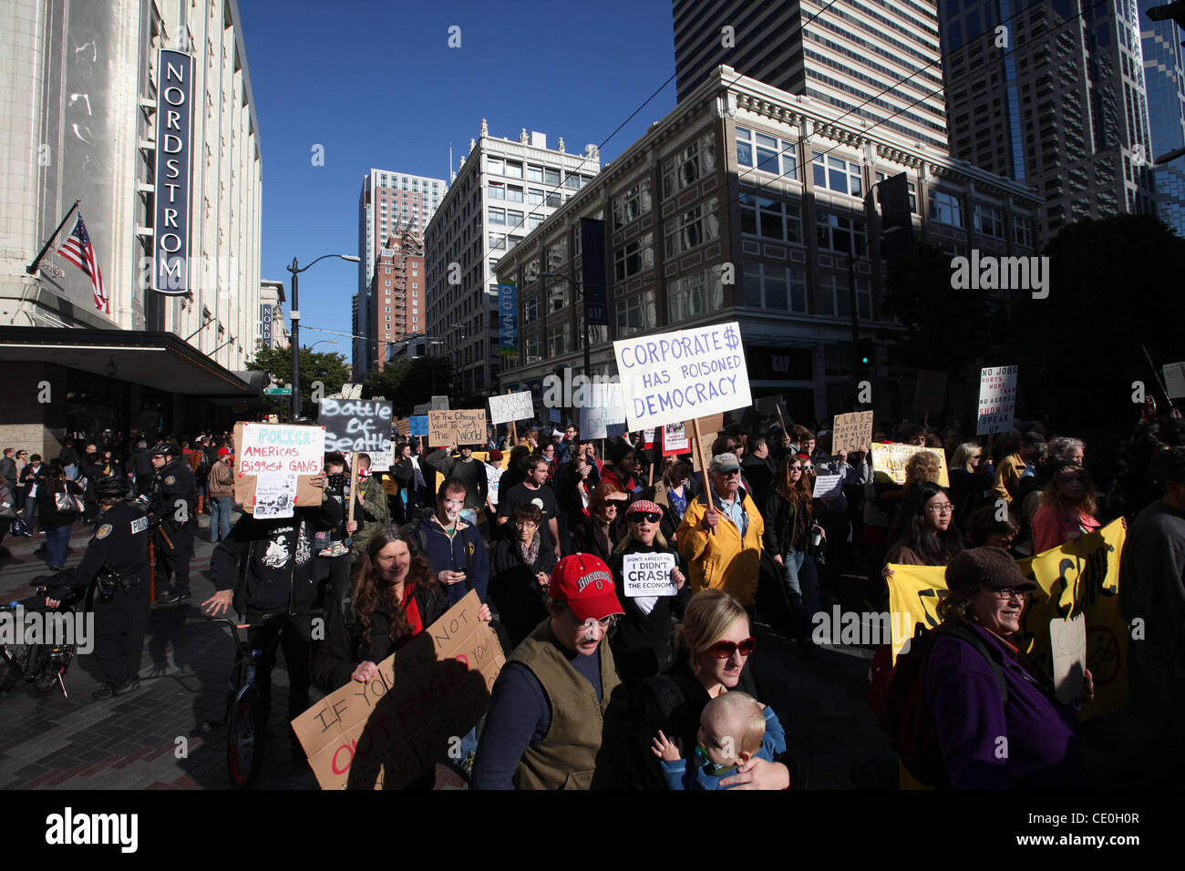Thousands march in downtown Seattle at Westlake Park and Pike Place ...