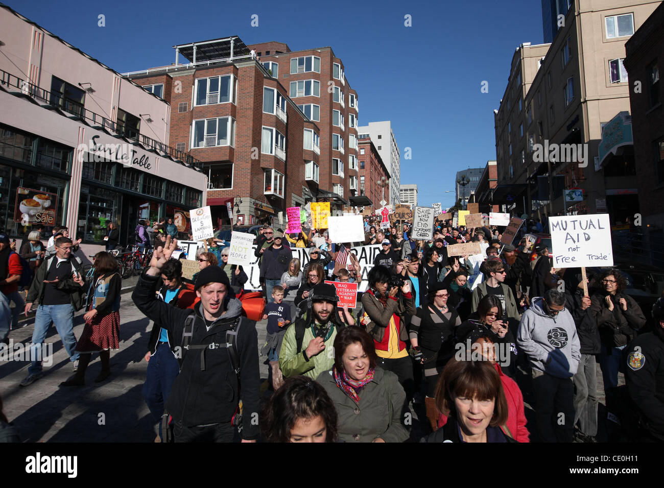 Thousands march in downtown Seattle at Westlake Park and Pike Place ...