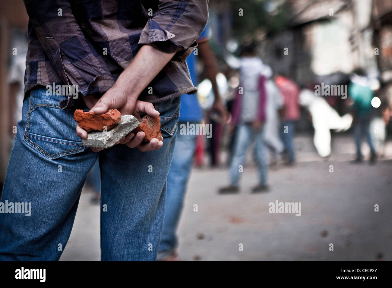 Stone pelting hi-res stock photography and images - Alamy