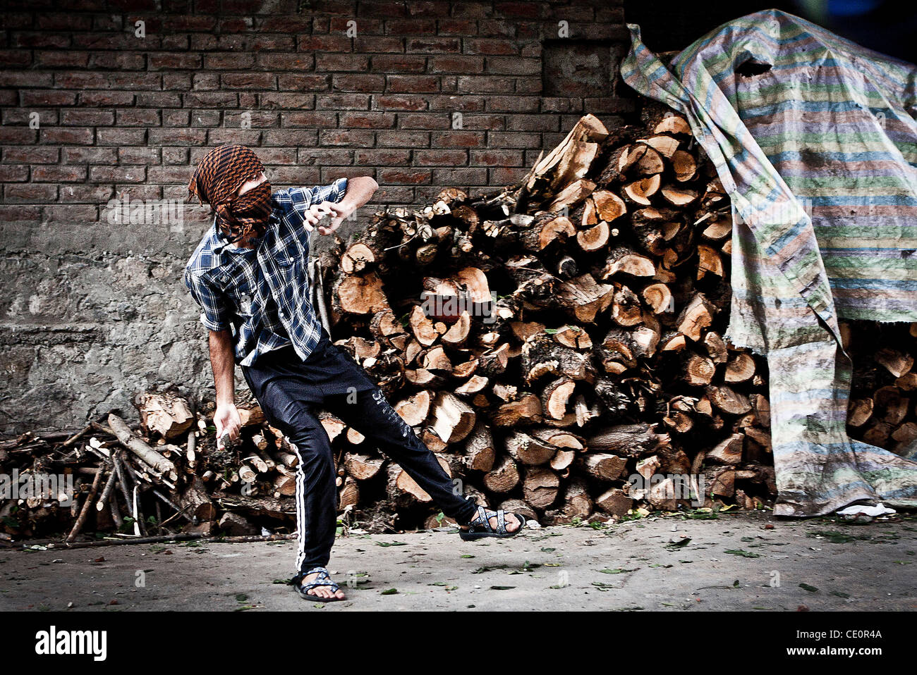 Kashmiri muslim protester hurl stones to the paramilitary indian force ...