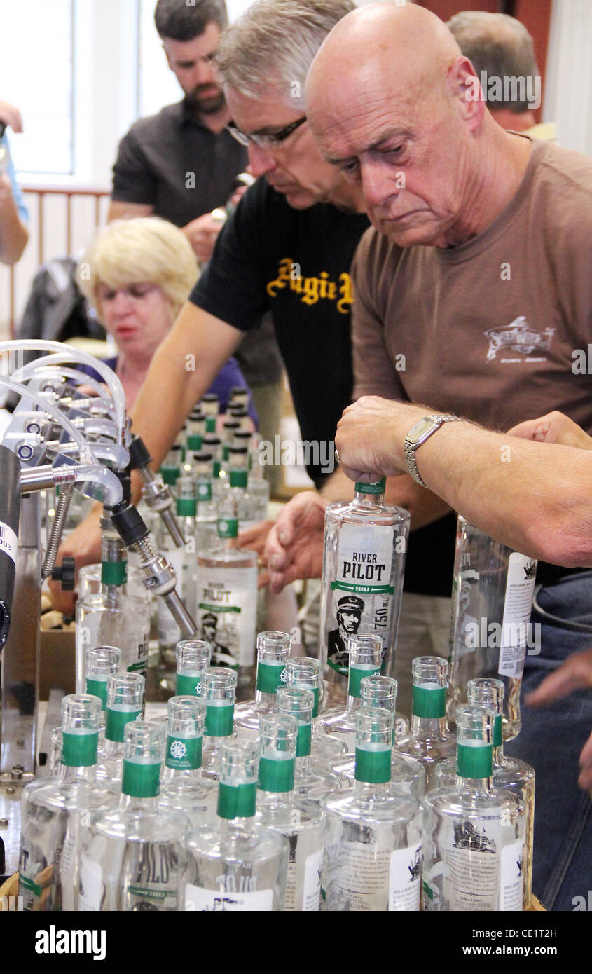 A dozen volunteers filled corked and sealed the first 1400 bottles of ...