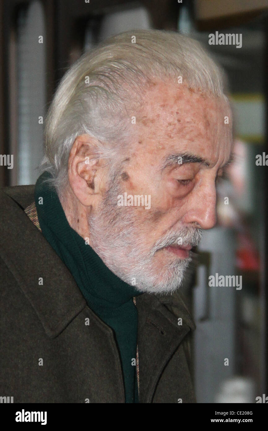 Christopher Lee looks old and fragile, walking with a cane as he is ...