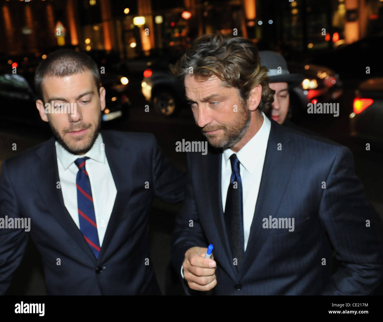 Gerard Butler arriving back at Regent hotel after the premiere of his ...