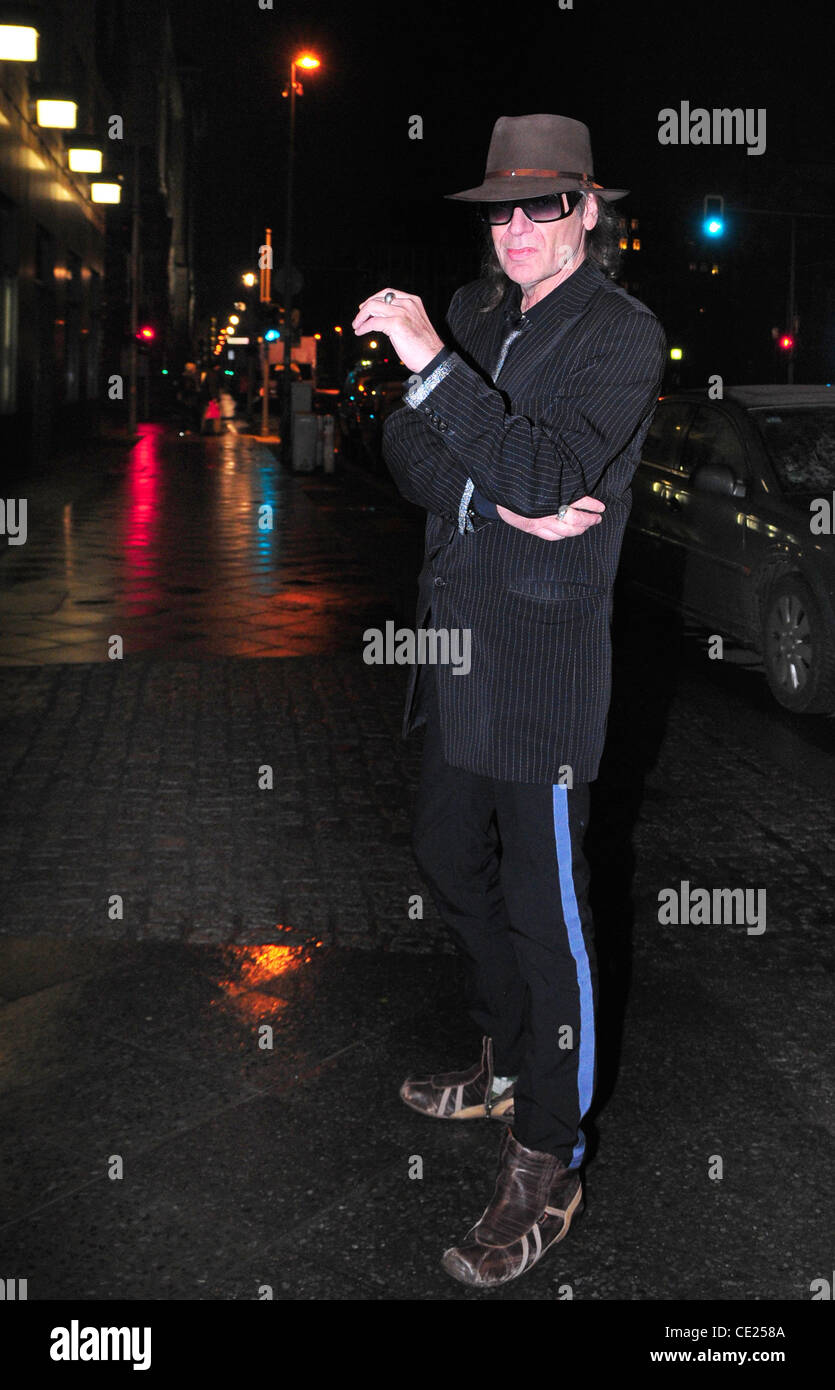 Udo Lindenberg in his favorite pose outside Borchardt restaurant ...