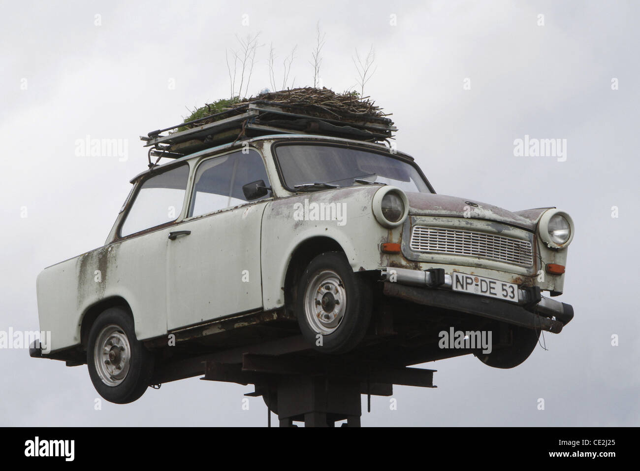 An old east german Trabant (Trabi) car is used as a stork nest near ...