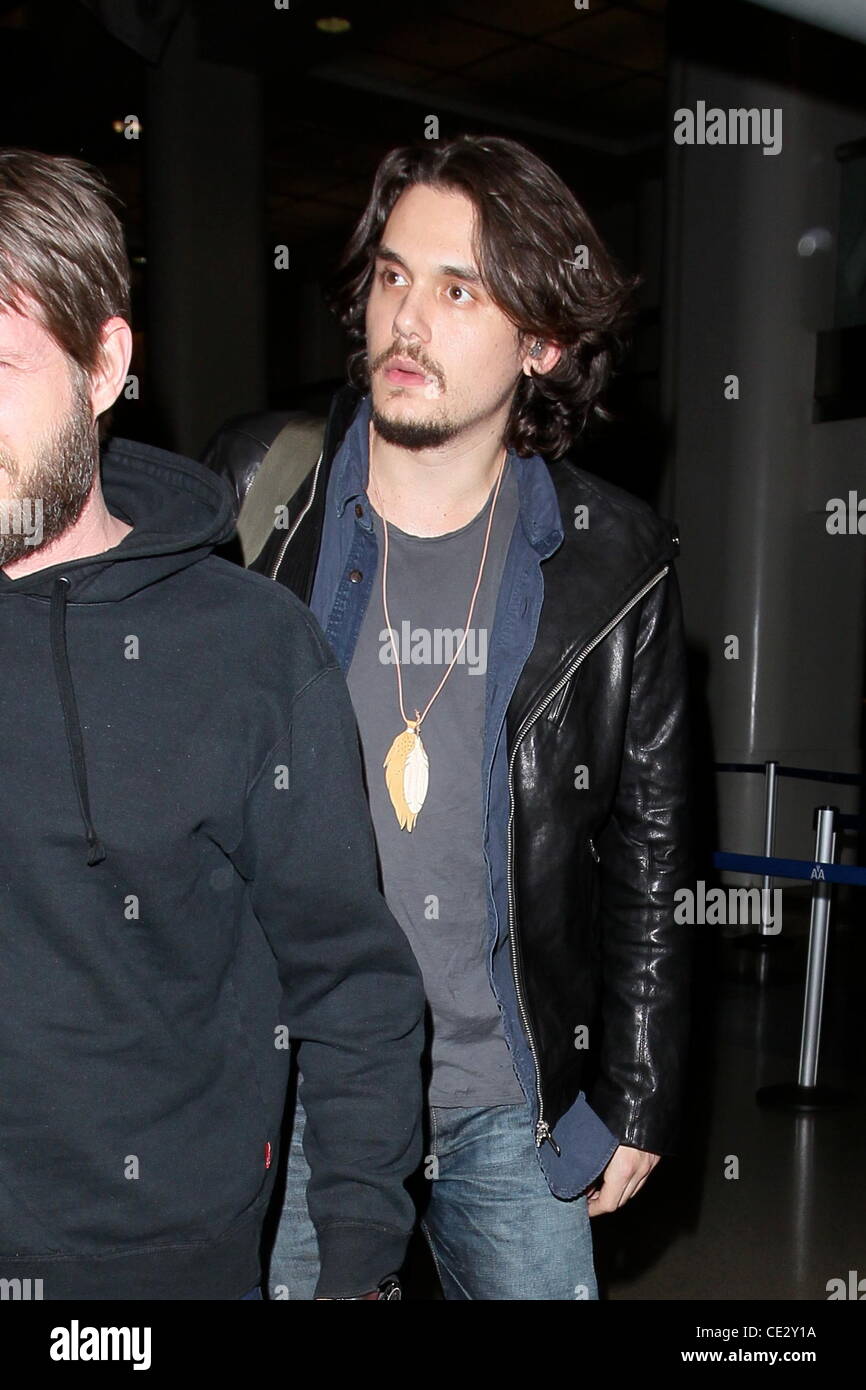 John Mayer arrives at LAX on a flight from New York City with friends ...