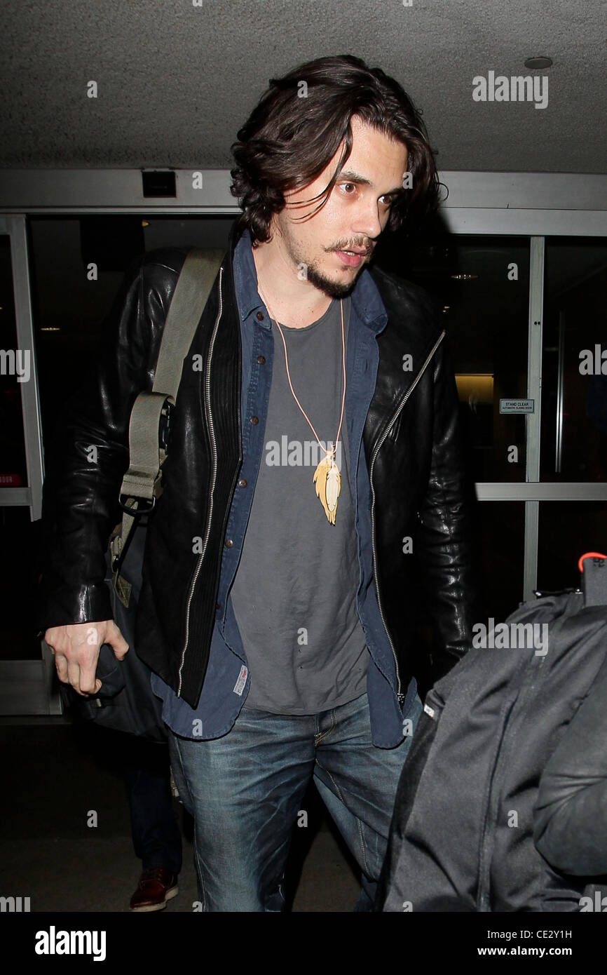 John Mayer arrives at LAX on a flight from New York City with friends ...