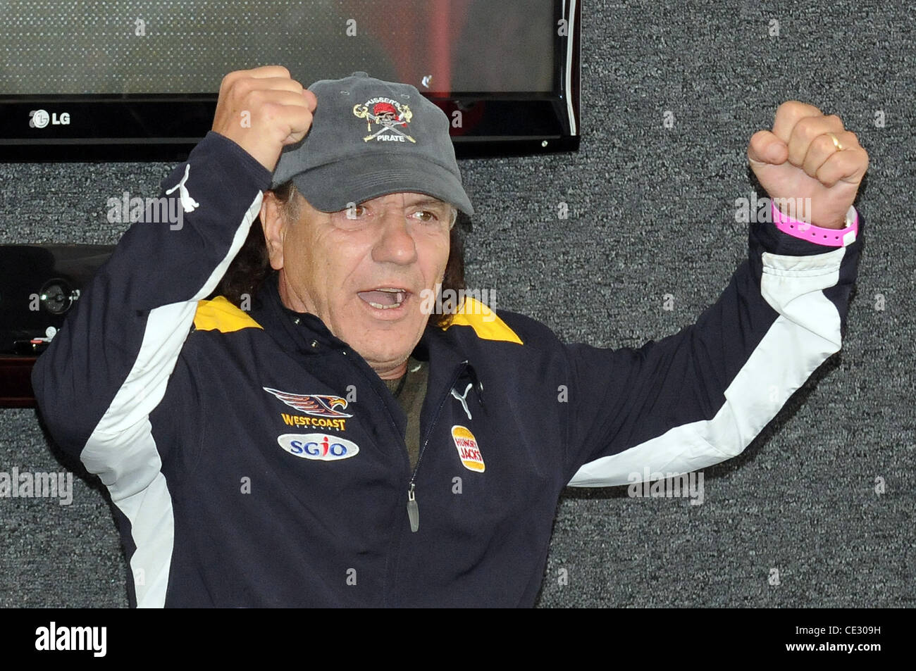 Brian Johnson of the band AC/DC competes in the Palm Beach Grand Prix ...