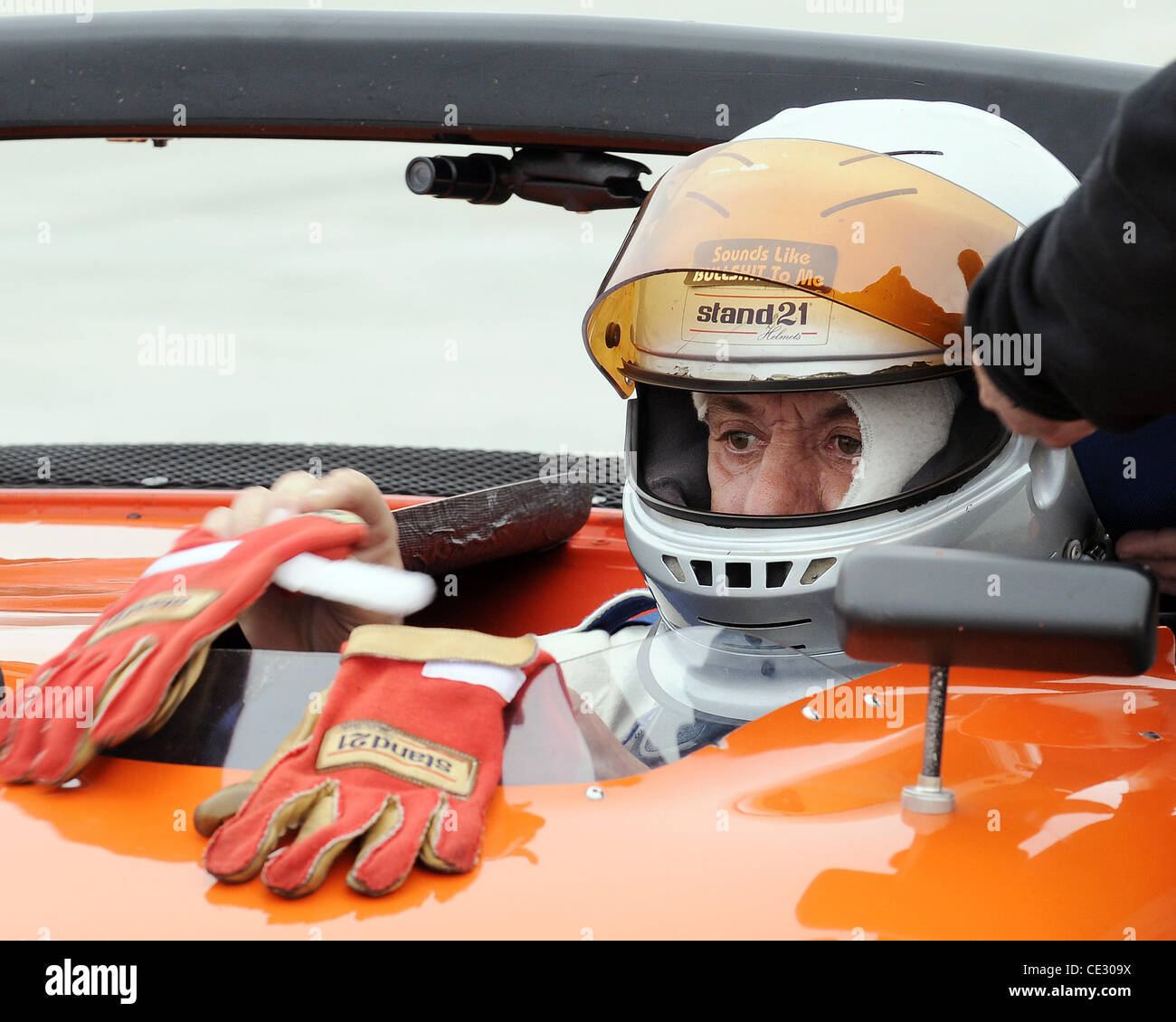 Brian Johnson of the band AC/DC competes in the Palm Beach Grand Prix ...