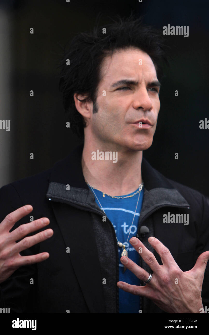 Train lead singer Pat Monahan films an interview for the entertainment ...