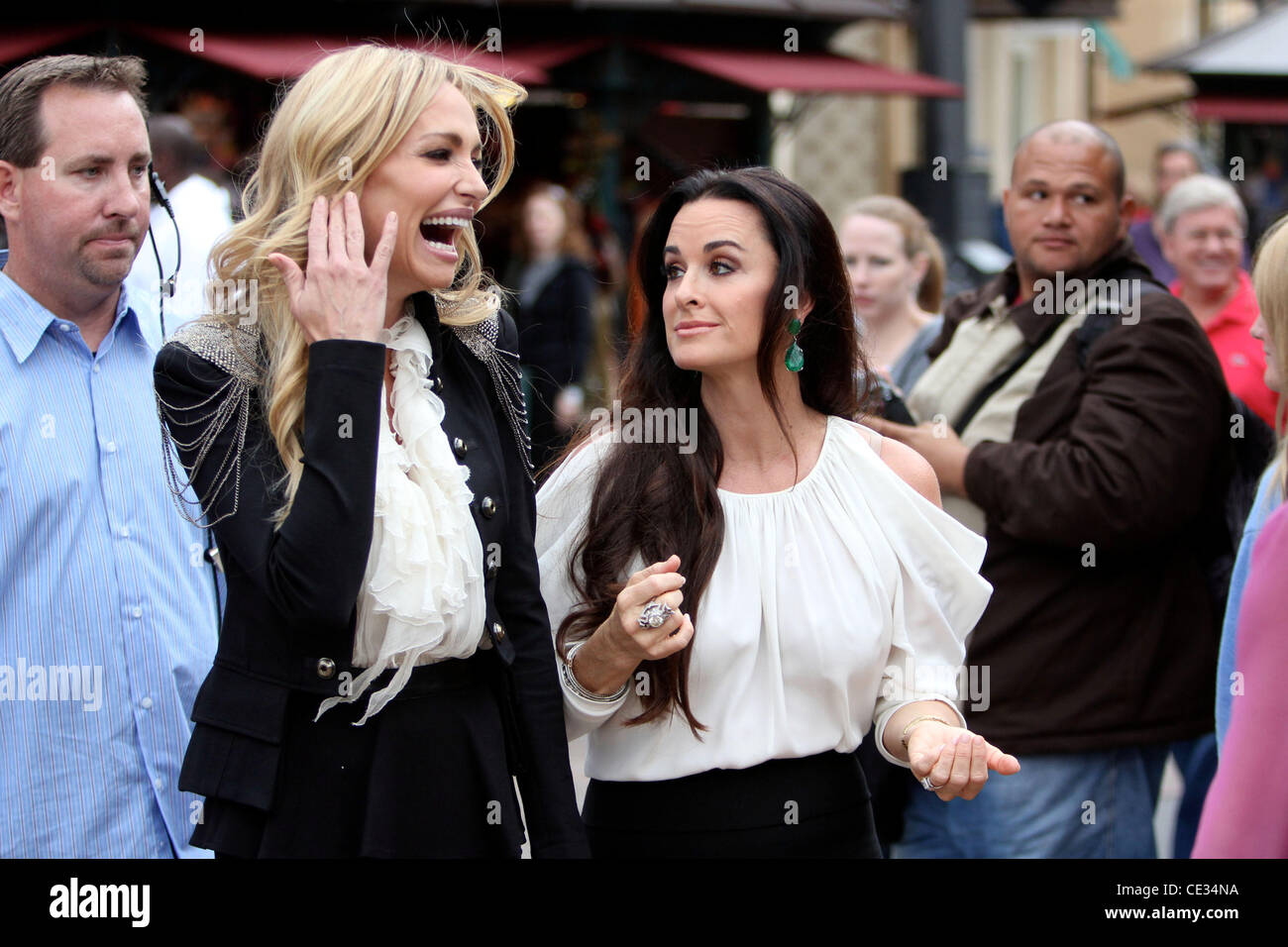 Taylor Armstrong and Kyle Richards filming an interview for the ...