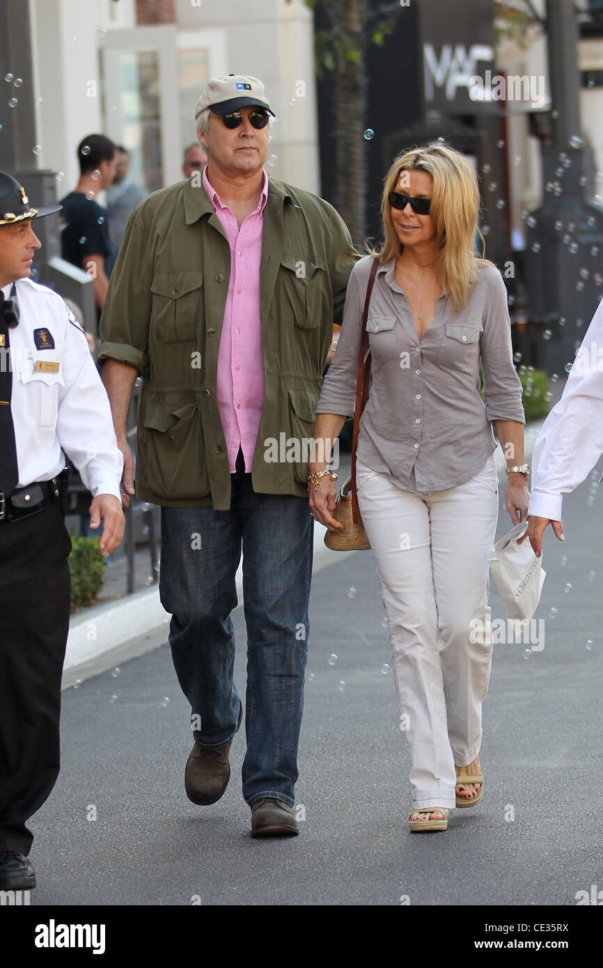 Chevy Chase and Jayni Luke filming an interview for the entertainment ...