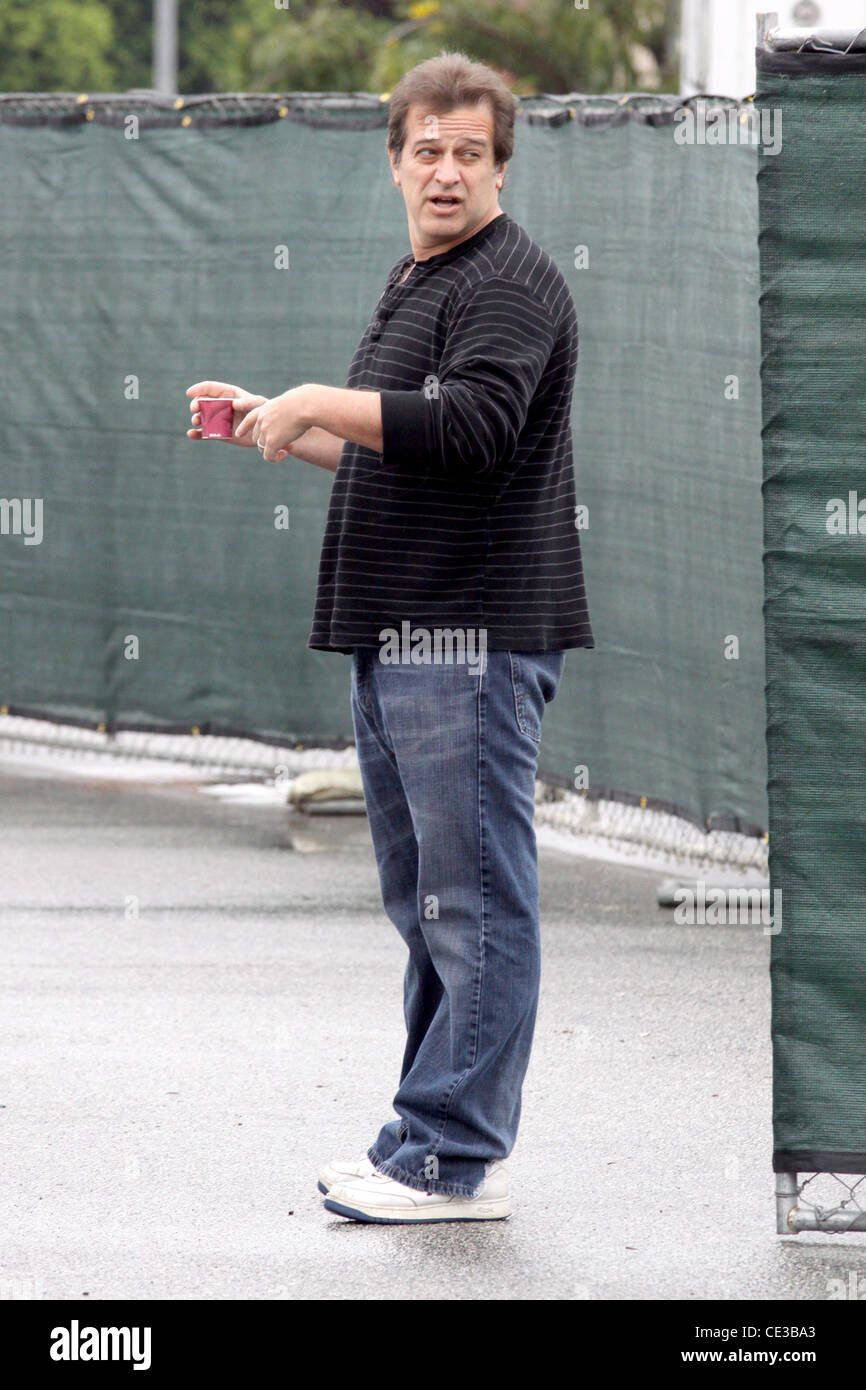 Todd Glass comedian Todd Glass drinking from a small cup on the set of ...