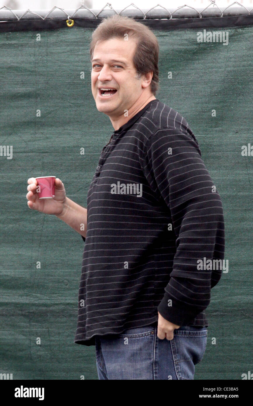 Todd Glass comedian Todd Glass drinking from a small cup on the set of ...
