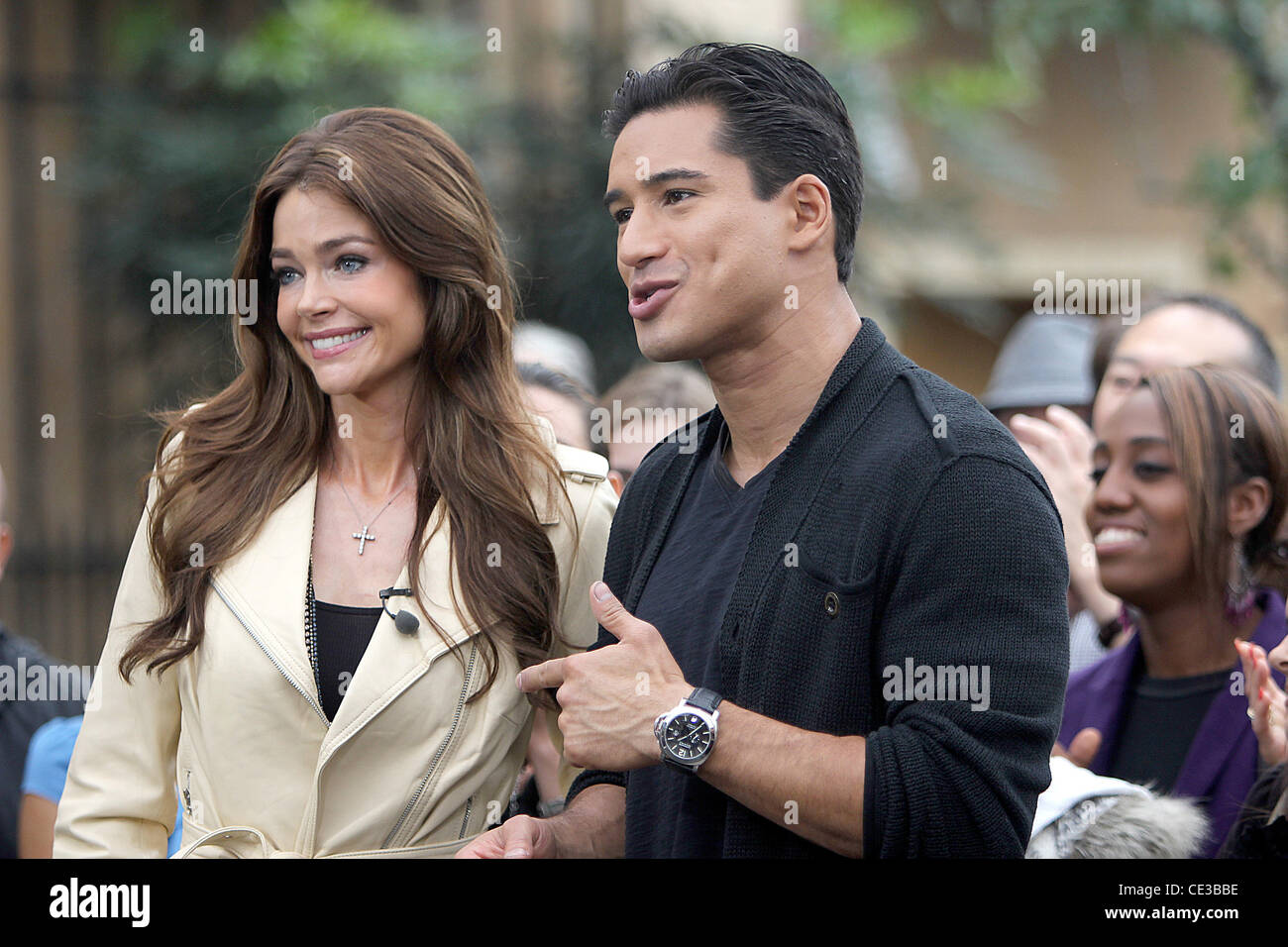 Denise Richards and Mario Lopez Denise Richards filming an interview ...
