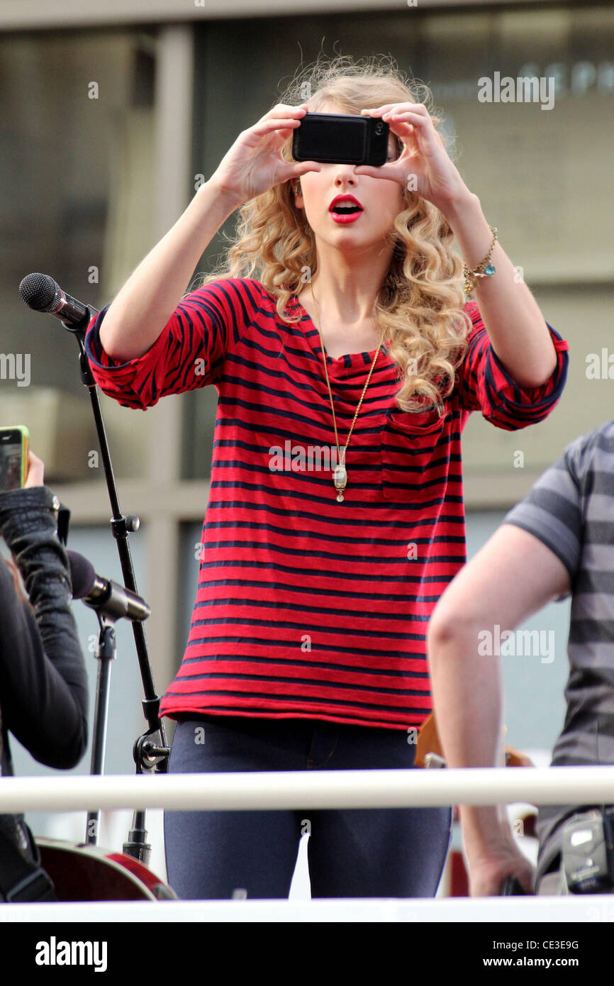 Taylor Swift taking photos Taylor Swift greets fans and promotes her ...