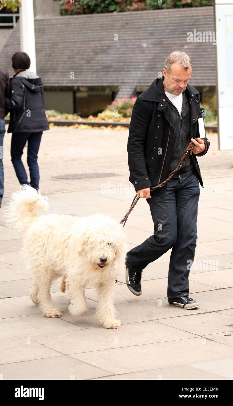 Graham Norton walks his dog outside the ITV Studios London, England ...