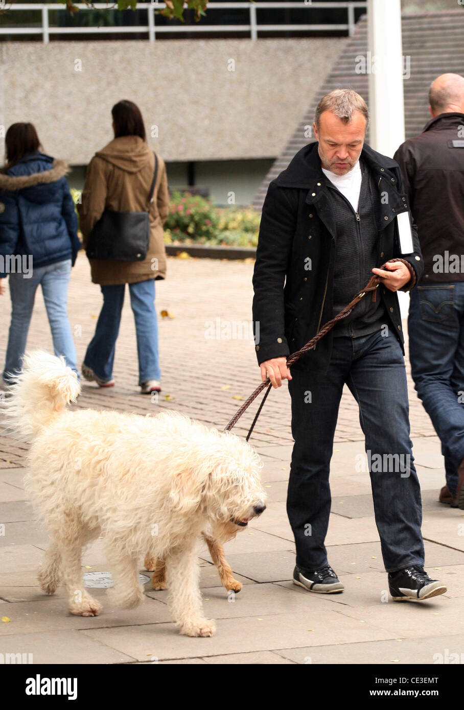 Graham Norton walks his dog outside the ITV Studios London, England ...