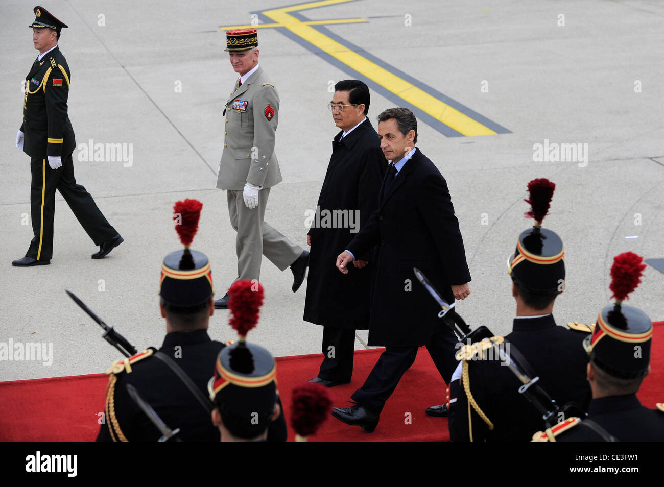 French President Nicolas Sarkozy and Chinese President Hu Jintao review ...