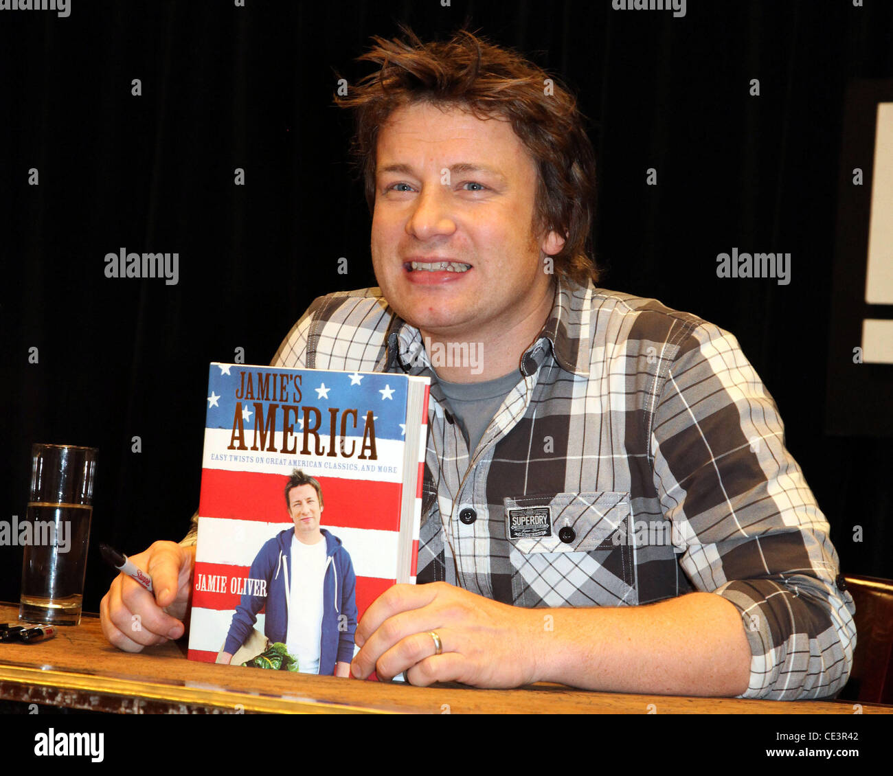 Jamie Oliver signs his latest cookbook 'Jamie's America' at Indigo ...