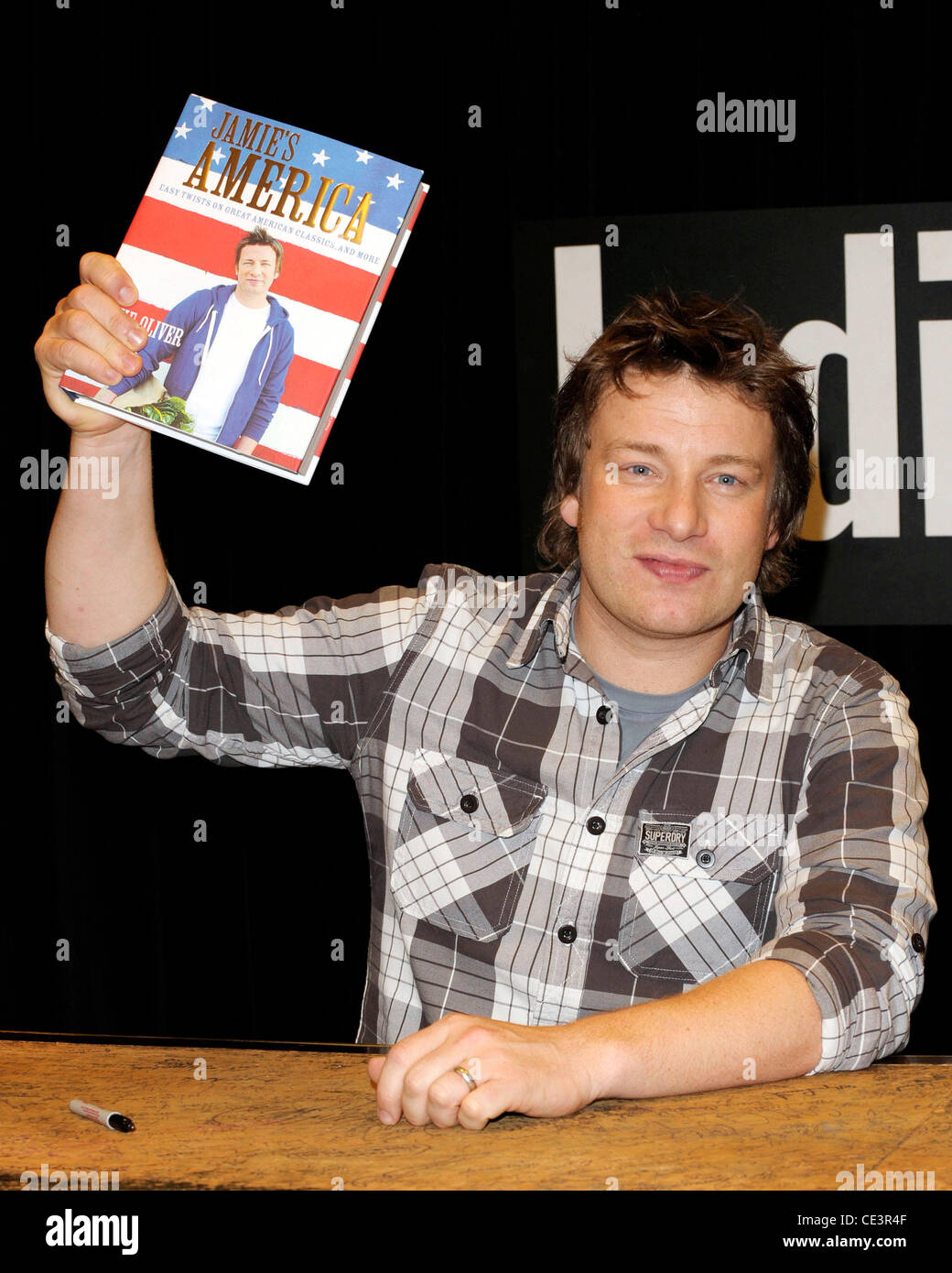 Jamie Oliver signs his latest cookbook 'Jamie's America' at Indigo ...
