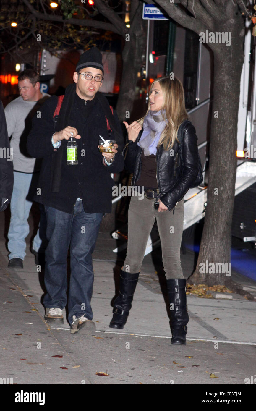 Jennifer Aniston and David Wain leave her trailer after a day of ...
