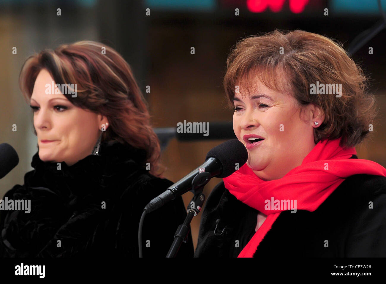 Amber Stassi and Susan Boyle performing live at Rockefeller Center as ...