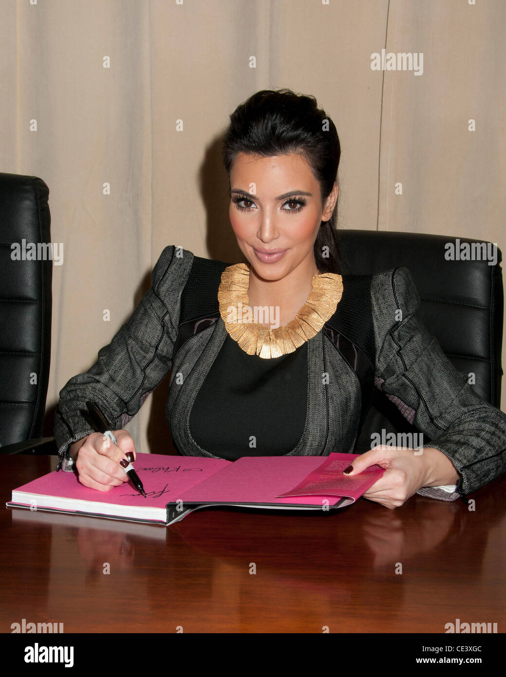 Kim Kardashian sign copies of her new book 'Kardashian Konfidential' at ...