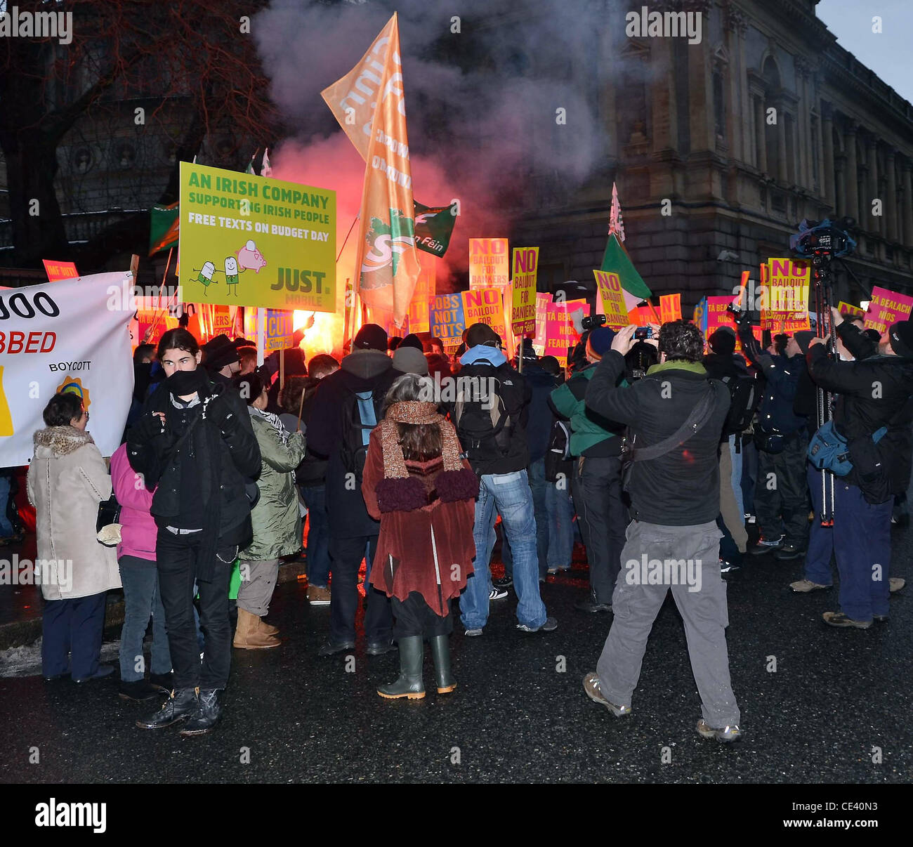 Angry protesters gather outside Leinster House on the announcement of ...