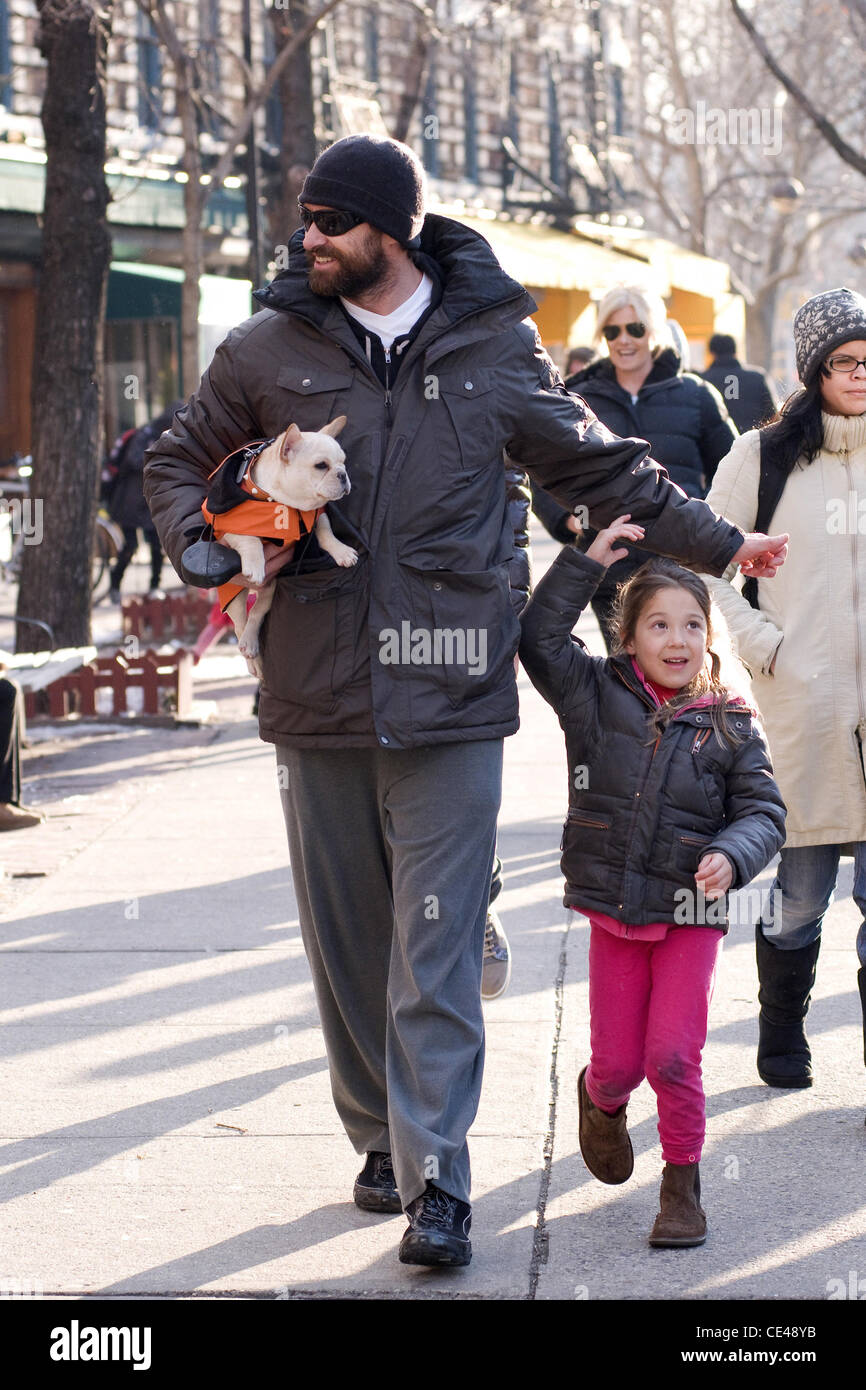 Hugh Jackman along with his wife and daughter Ava Jackman walk their ...