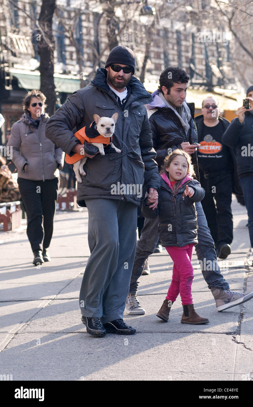 Hugh Jackman along with his wife and daughter Ava Jackman walk their ...