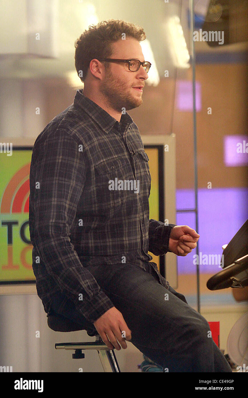 Seth Rogan riding a workout bicycle during the interview to promote ...