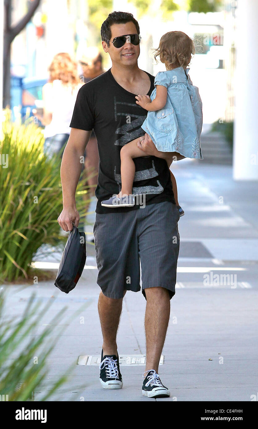 Cash Warren with his daughter Honor Warren, leaving a cafe after having ...