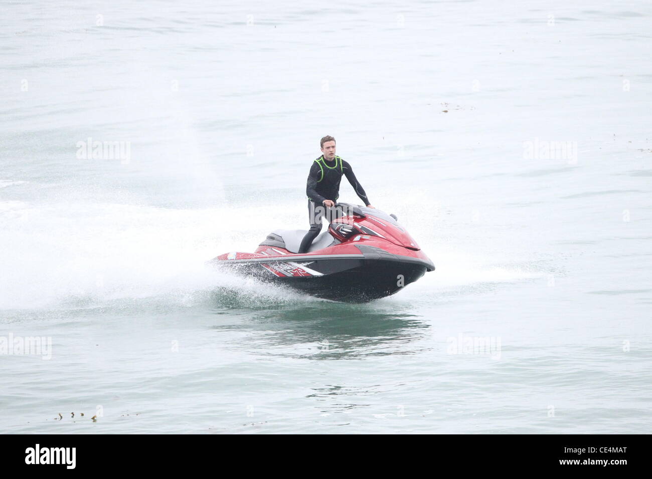 Justin Timberlake rides a jet ski while filming 'Friends with Benefits ...