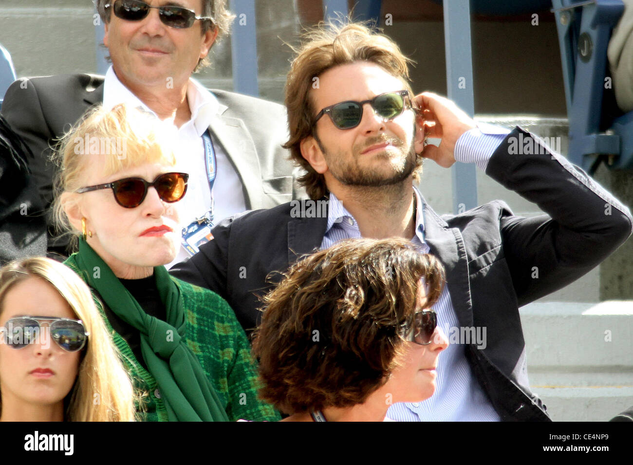 Guest and Bradley Cooper Celebrities watching the women's semifinals ...