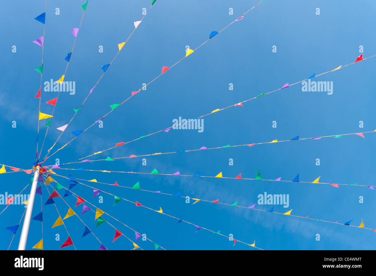 bunting flags blowing in the wind against a saturated blue sky Stock ...