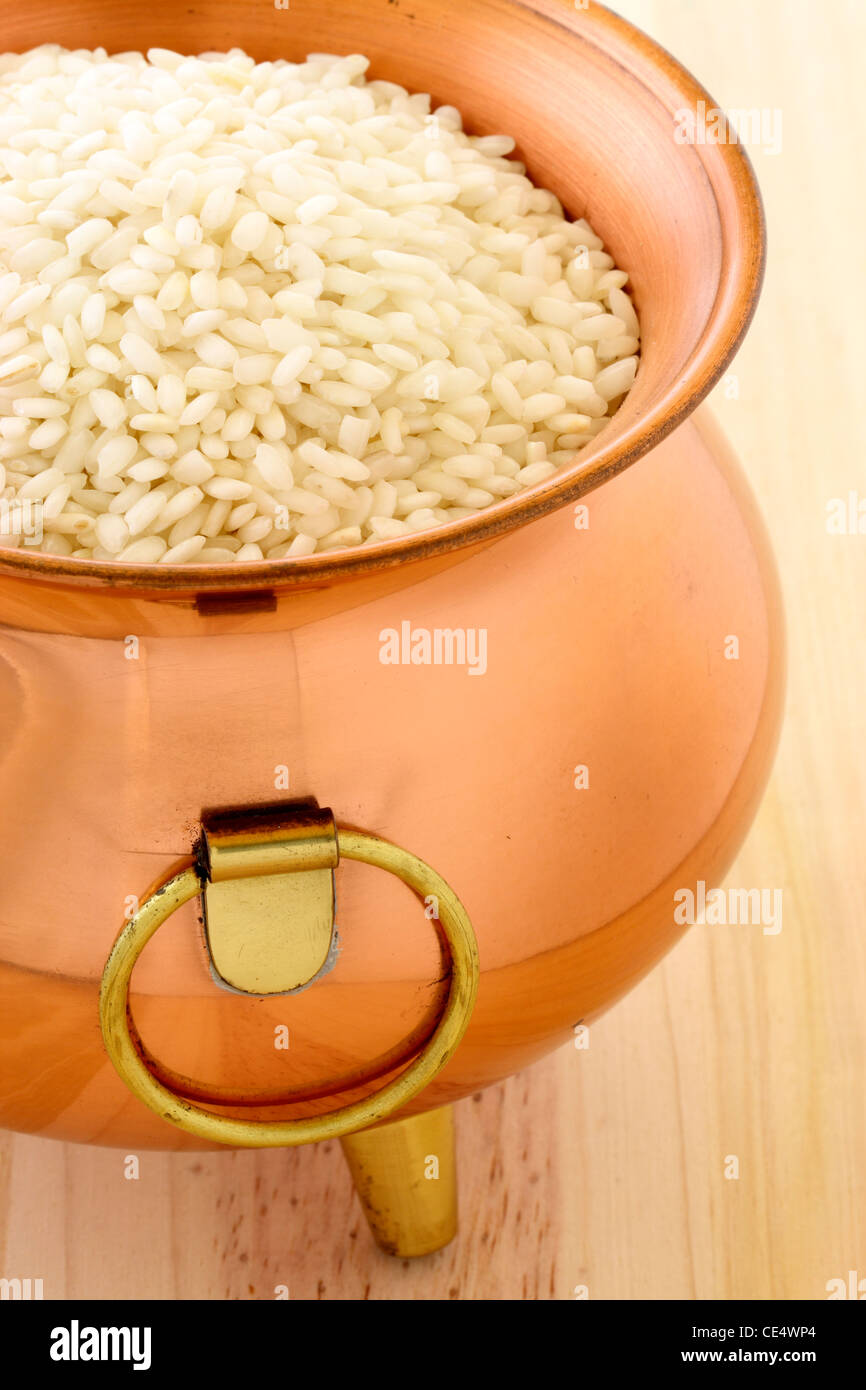 raw arborio rice used to make risotto, one of the most famous and ...